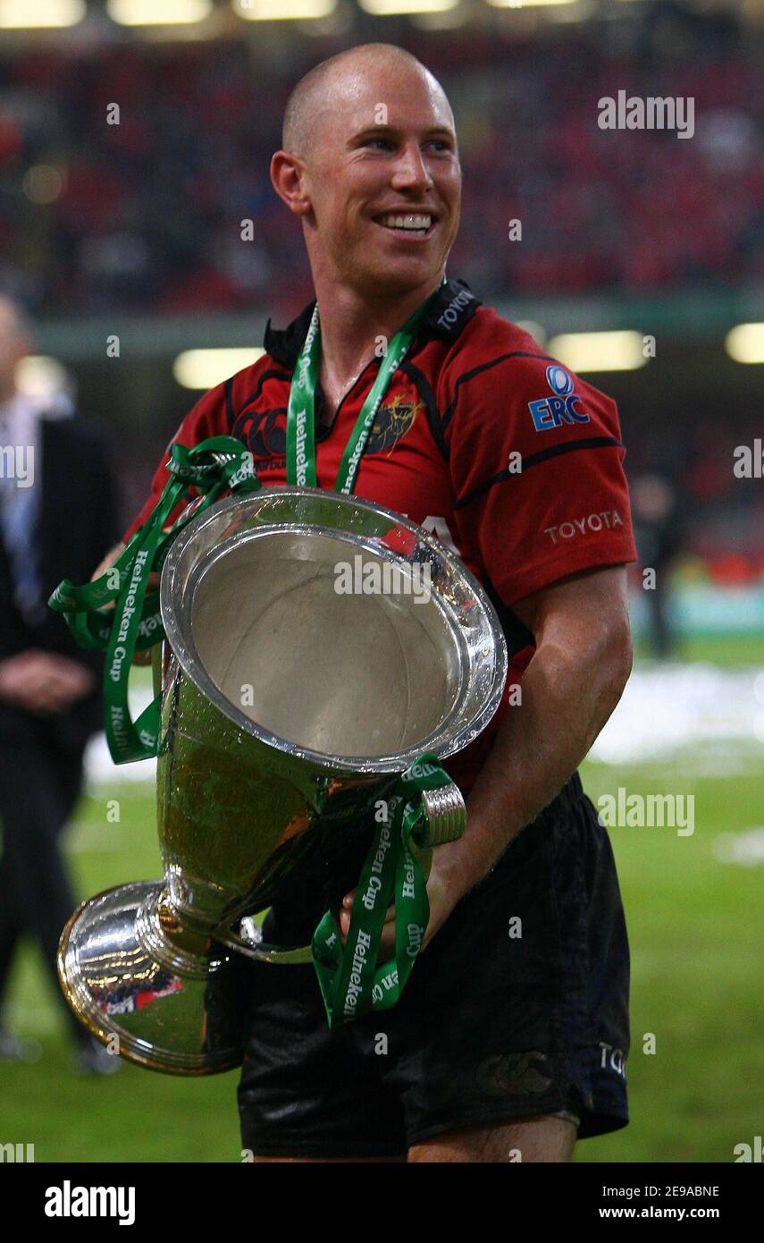 Munster's Peter Stringer celebrates the victory with the Cup during the ...