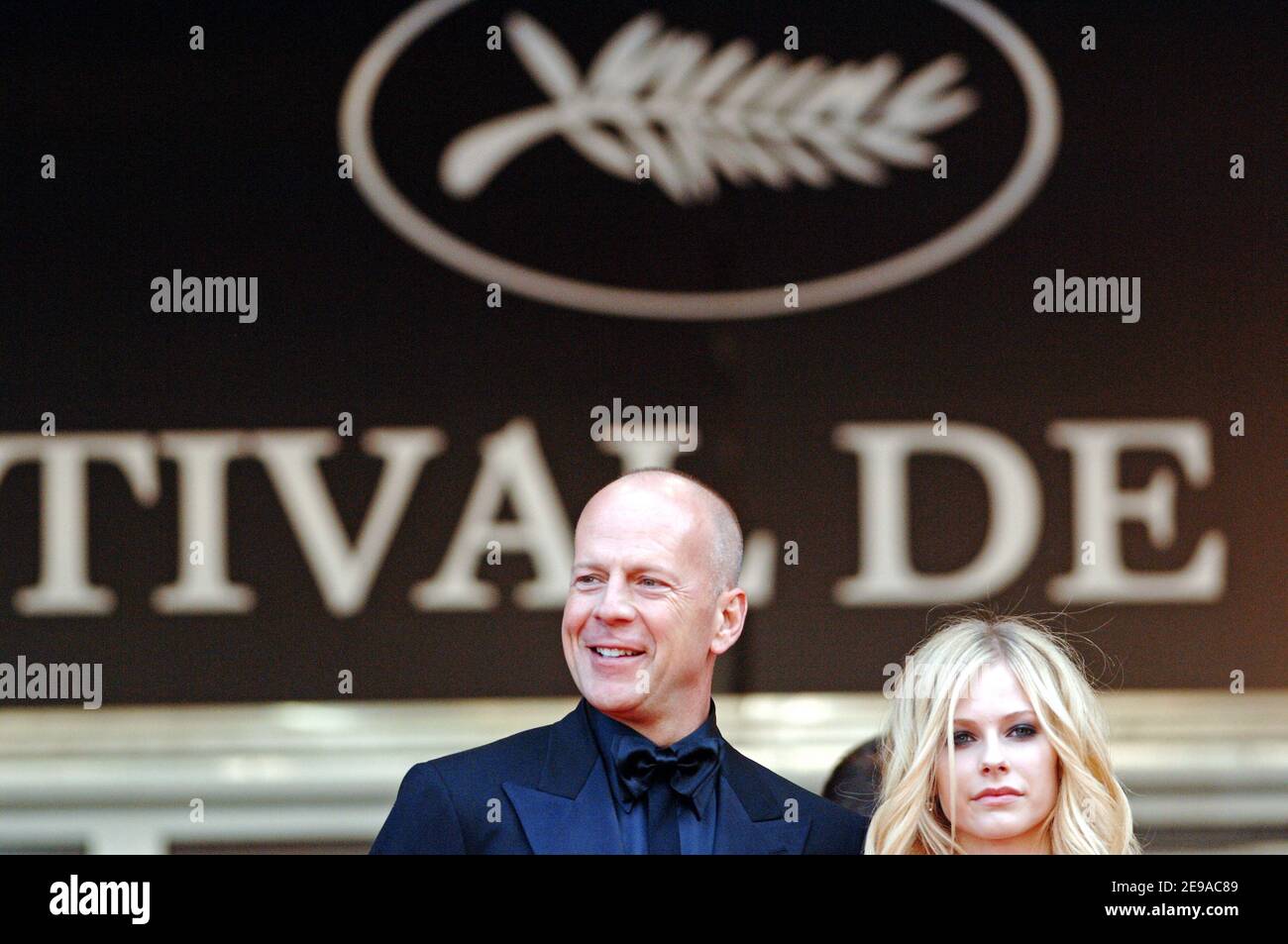 Bruce Willis and Avril Lavigne arrive for a screening of U.S. directors ...