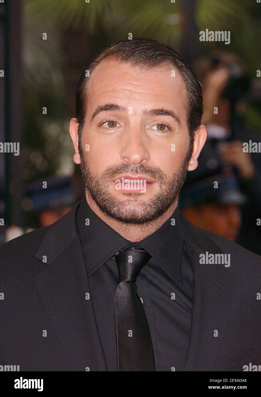 French actor Jean Dujardin arrives for the screening of Nanni Moretti's ...