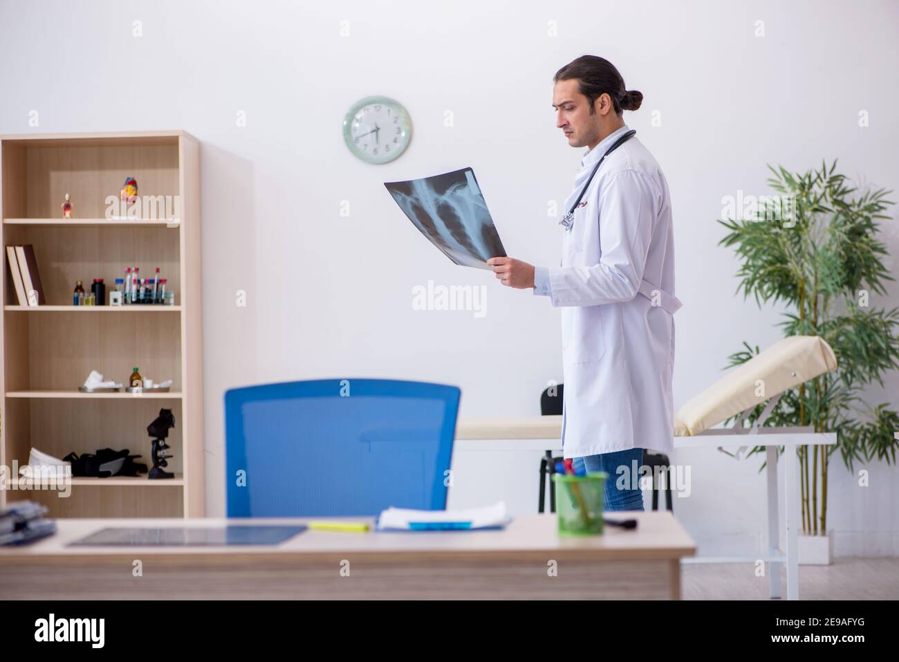 Young doctor radiologist working in the clinic Stock Photo - Alamy