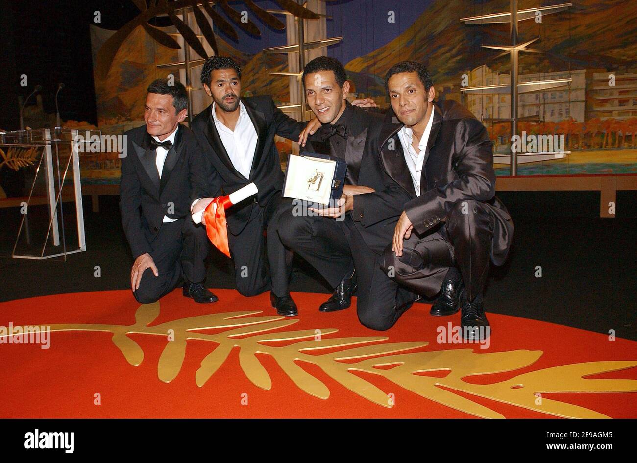 Actors Jamel Debbouze, Roschdy Zem and Sami Bouajila pose with their ...