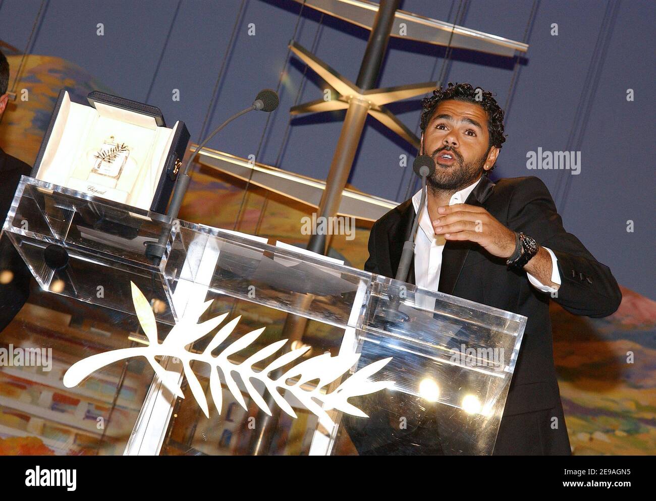 French actor Jamel Debbouze delivers his acceptance speech after he ...
