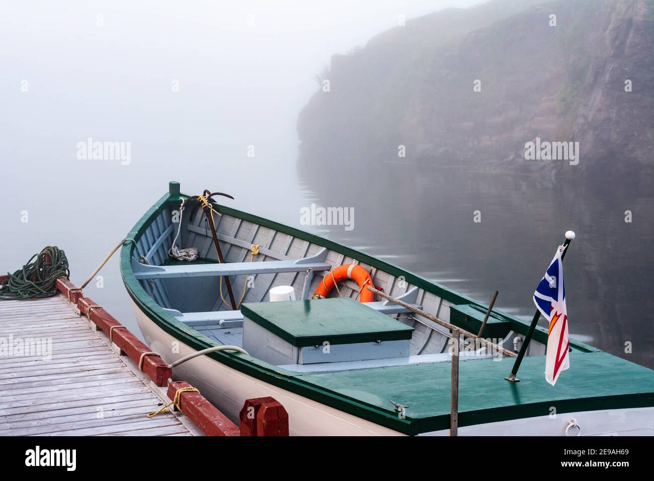 Boat and Dock in Fog Stock Photo - Alamy