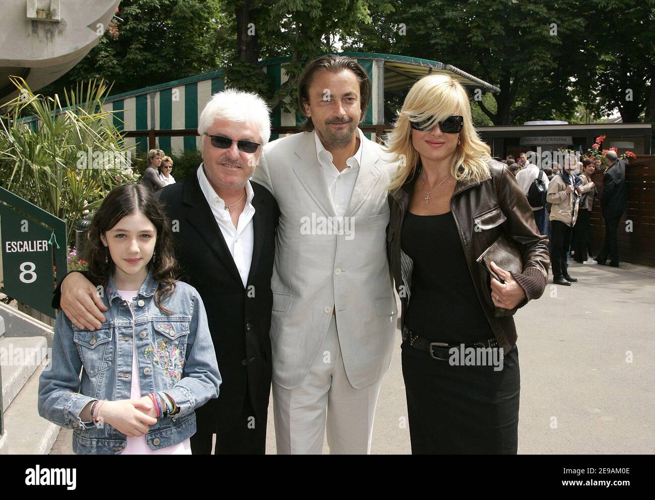 French former tennis player Henri Leconte (c) and French musician Marc ...