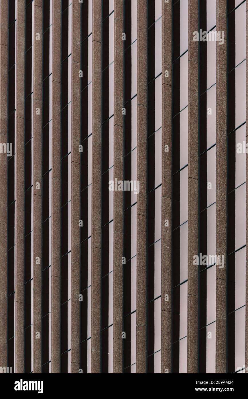 Vertical shot of long metal bars in a row Stock Photo - Alamy