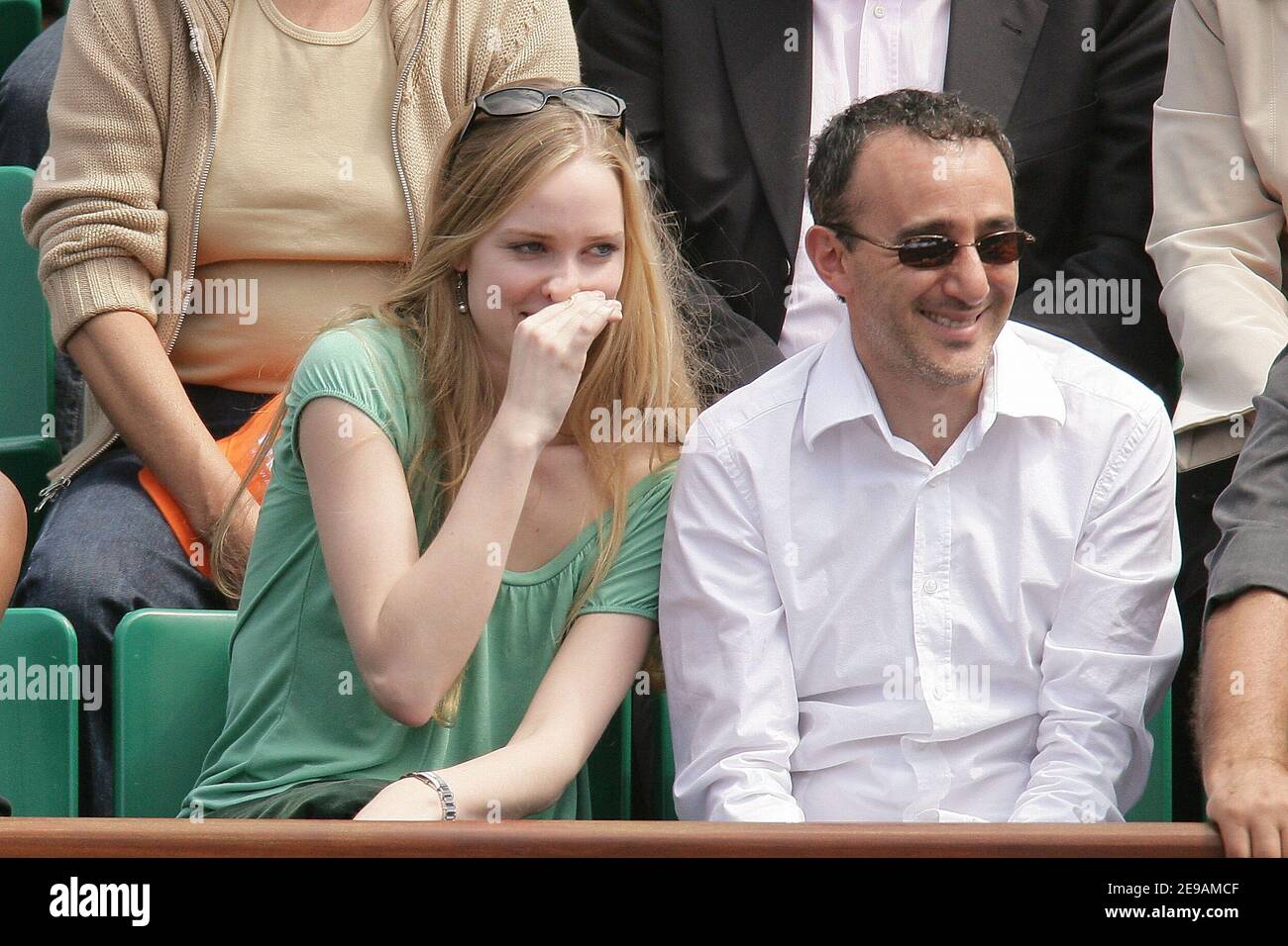 French humorist Elie Semoun and his girlfriend watch a game during the ...