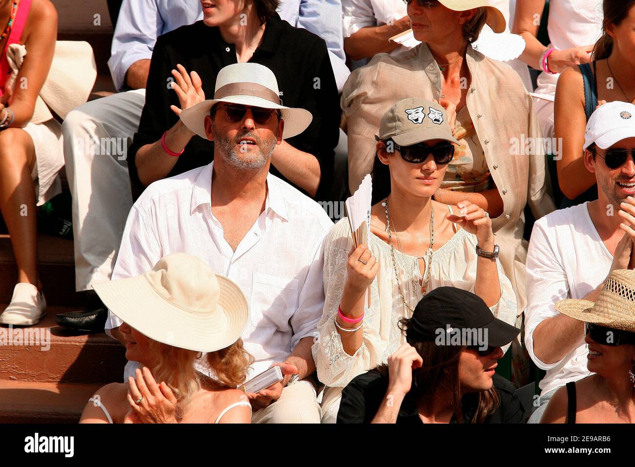 Jean Reno and girlfriend during the men's final of the French Tennis ...