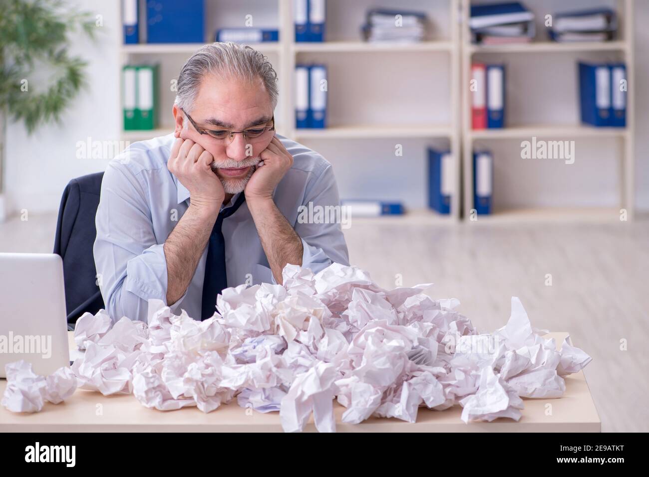 Old businessman rejecting ideas with lots of papers Stock Photo - Alamy