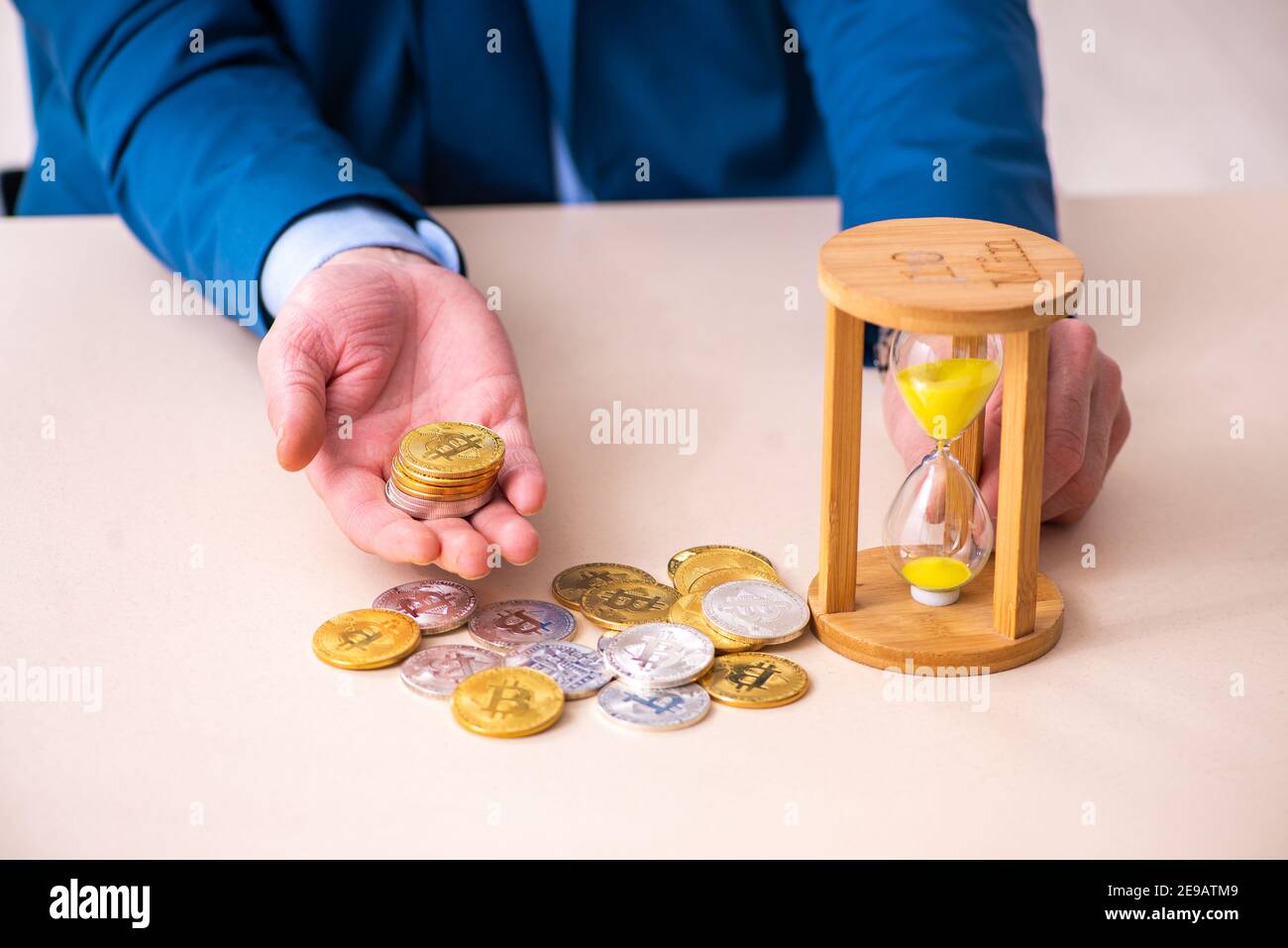 Man earning money via Internet in time management concept Stock Photo ...