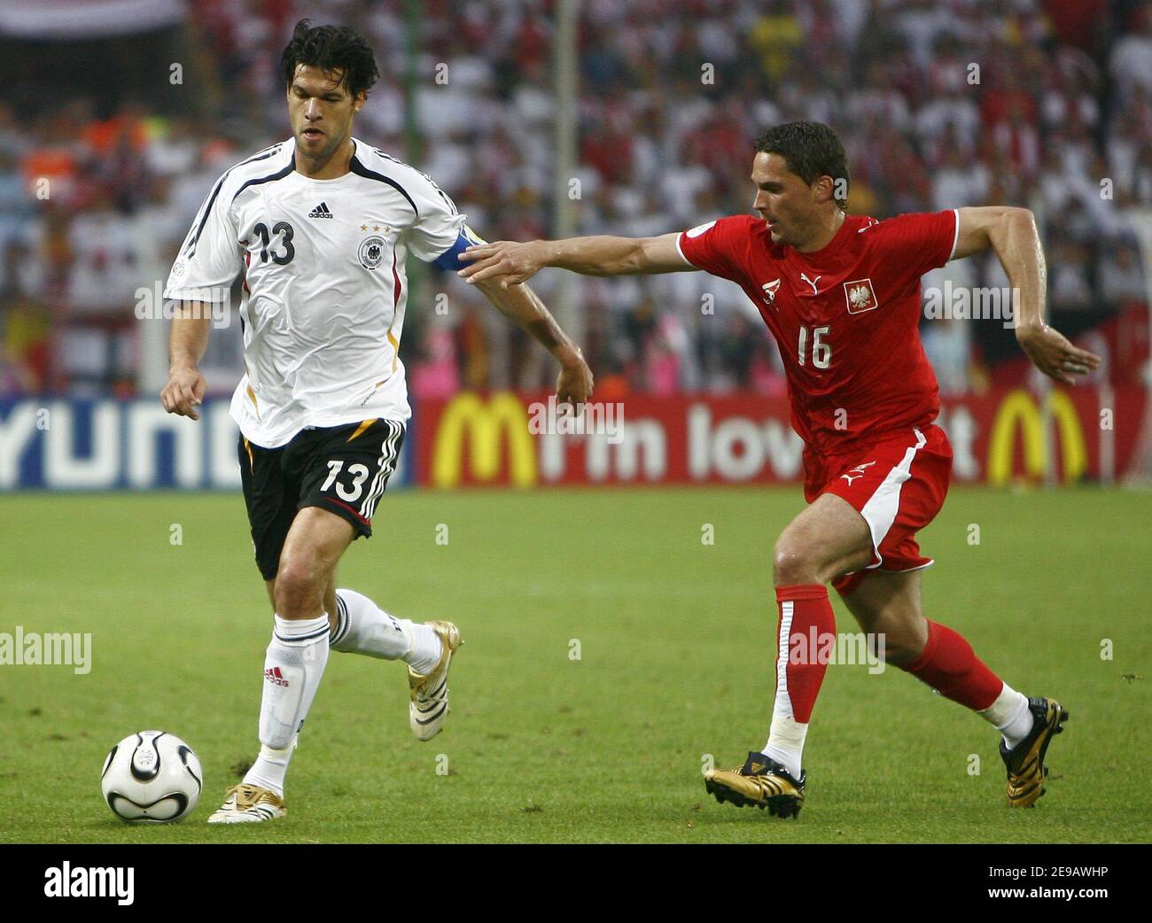Germany's Michael Ballack and Poland'sArkadiusz Radomski during the ...