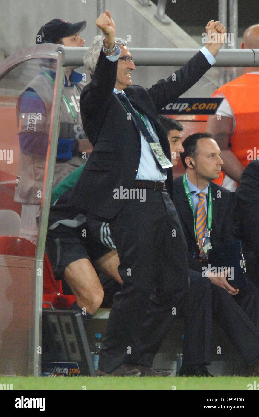 French coach Raymond Domenech celebrateafter the opening goal of the ...