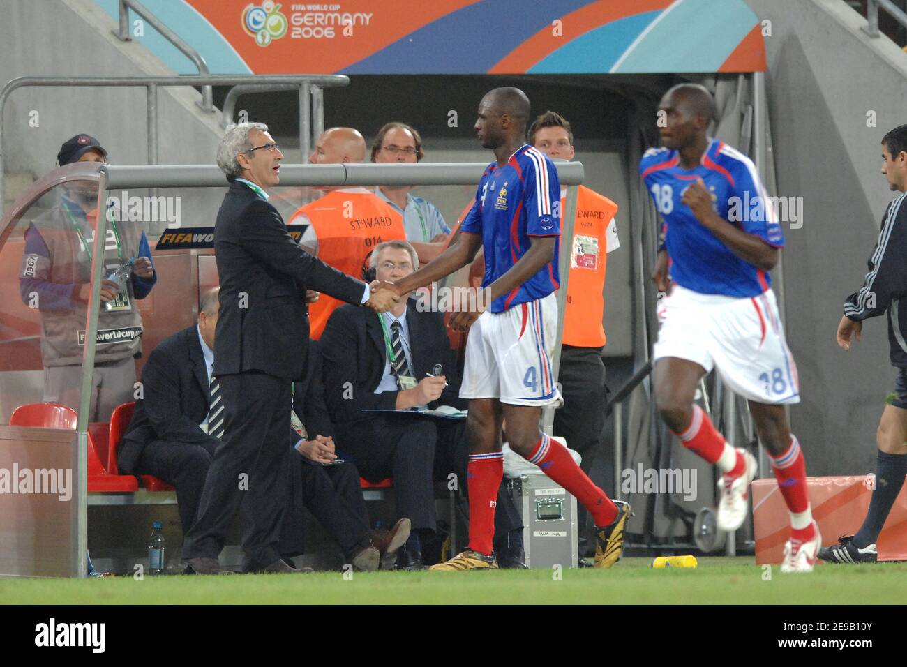 France's Patrick Vieira shakes hand with coach Raymond Domenech during ...