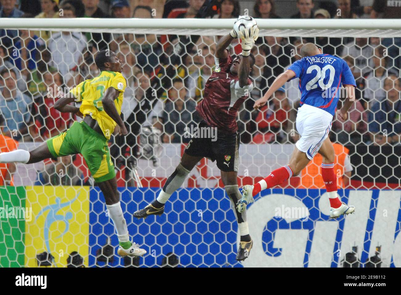 France's David Trezeguet and Togo's Kossi Agassa in action during the ...