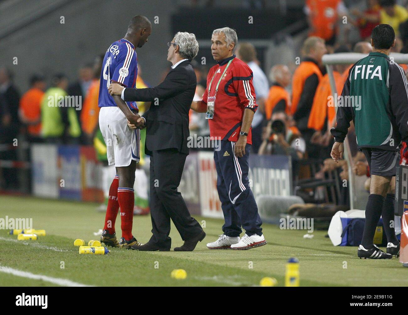 France's Patrick Vieira shakes hand with coach Raymond Domenech during ...