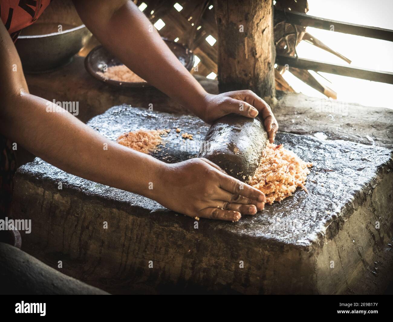 Young indian woman cooking in hi-res stock photography and images - Alamy