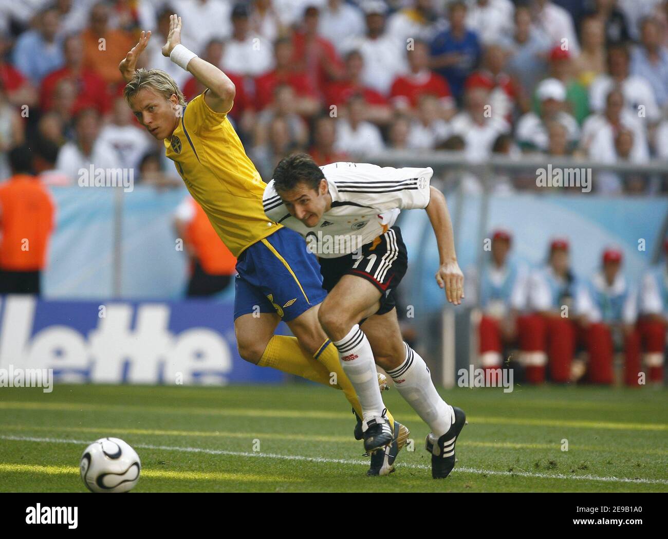 Sweden's Erik Edman and Germany's Miroslav Klosse during the World Cup ...