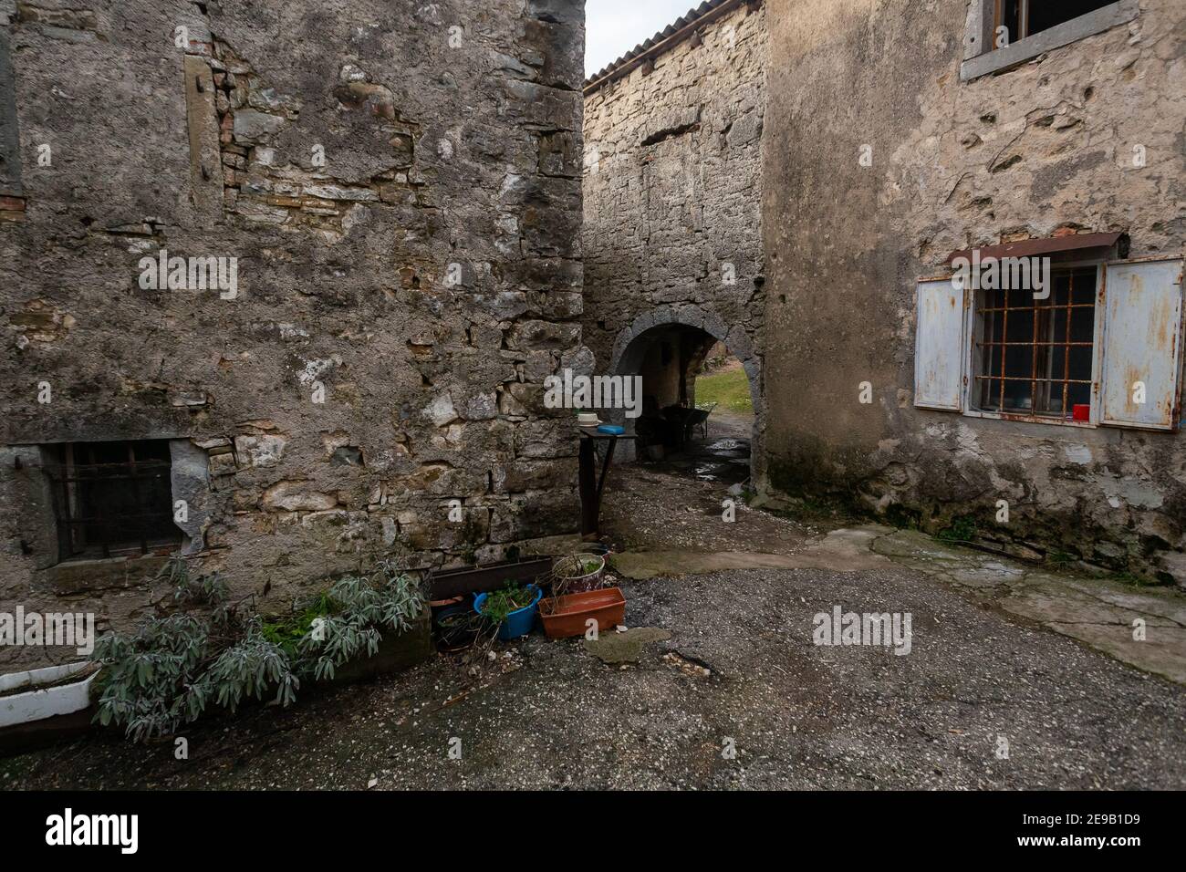 Narrow street of a medieval town with old house buildings Stock Photo ...