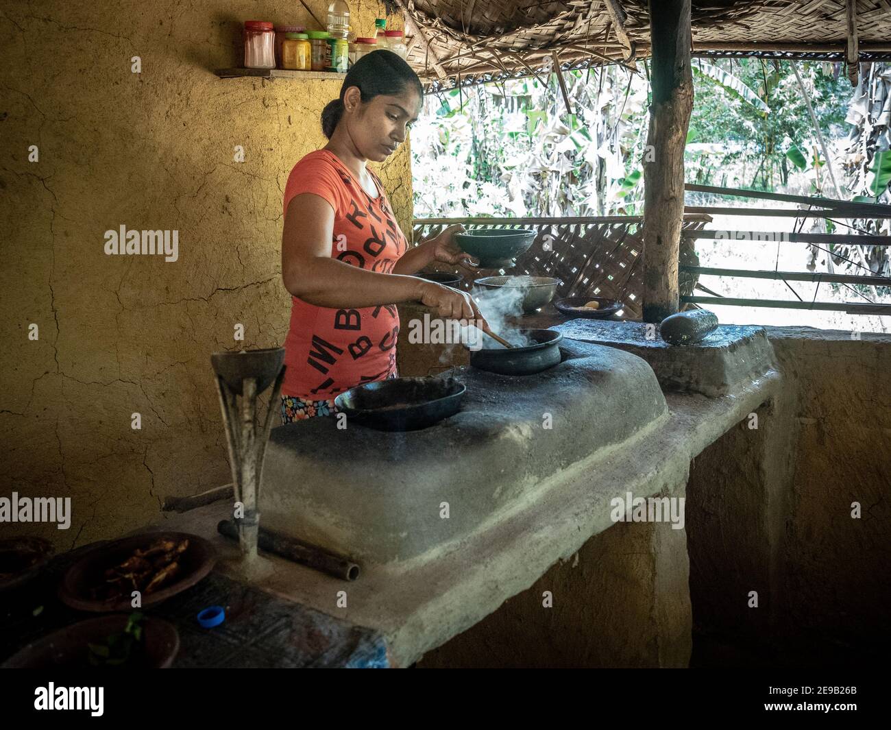 Woman kitchen eating curry hi-res stock photography and images - Alamy