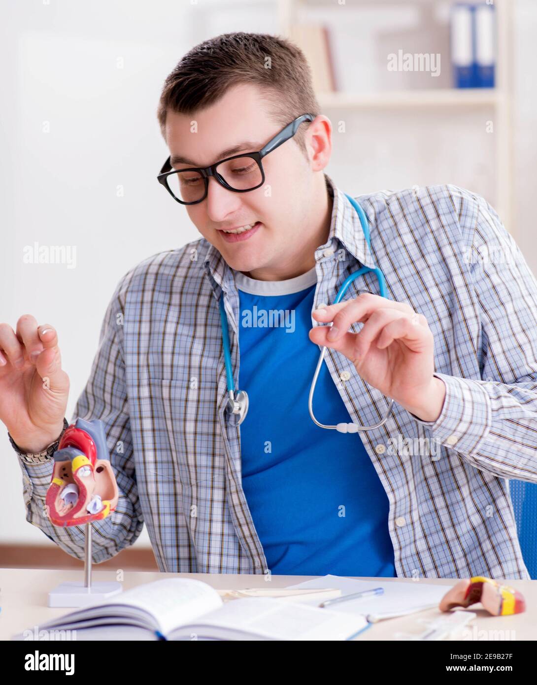 The medical student studying heart in classroom during lecture Stock ...
