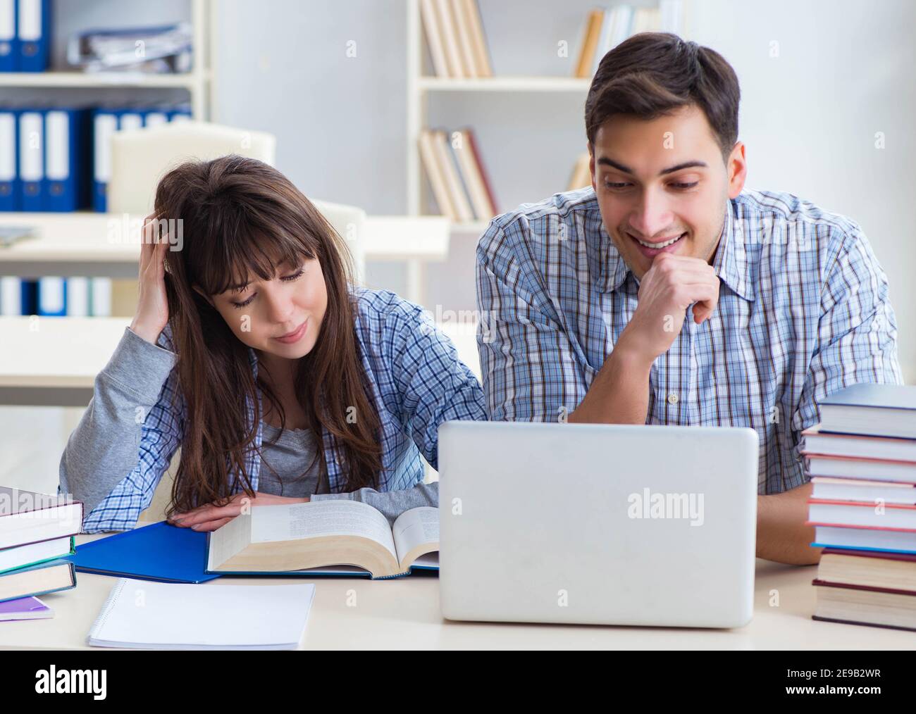 The students sitting and studying in classroom college Stock Photo - Alamy