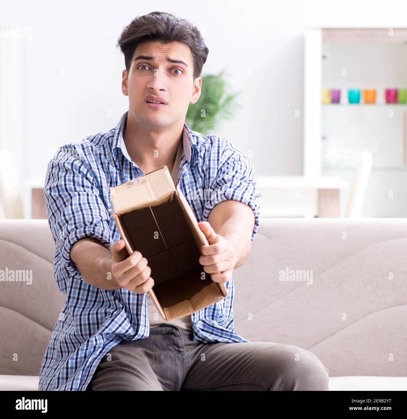 The man receiving empty parcel with stolen goods Stock Photo - Alamy