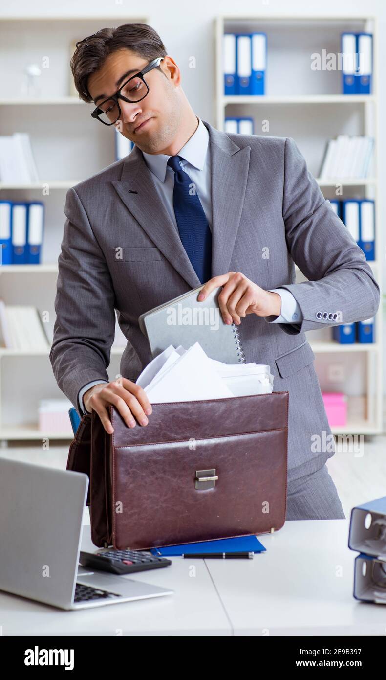The employee with too much work taking it home Stock Photo - Alamy