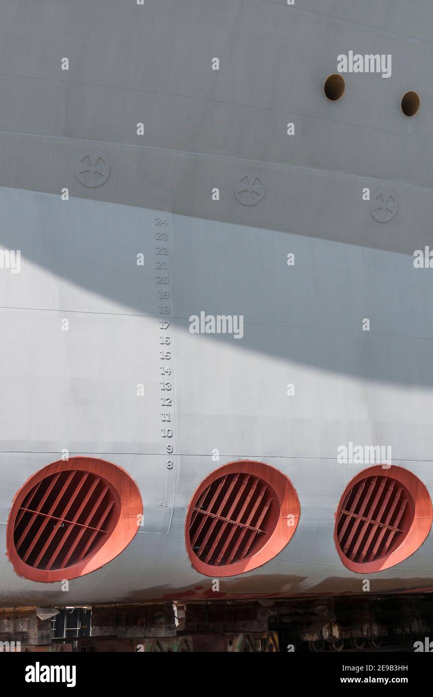 Detail view of the lower port side of a large ocean-going ship in dry ...