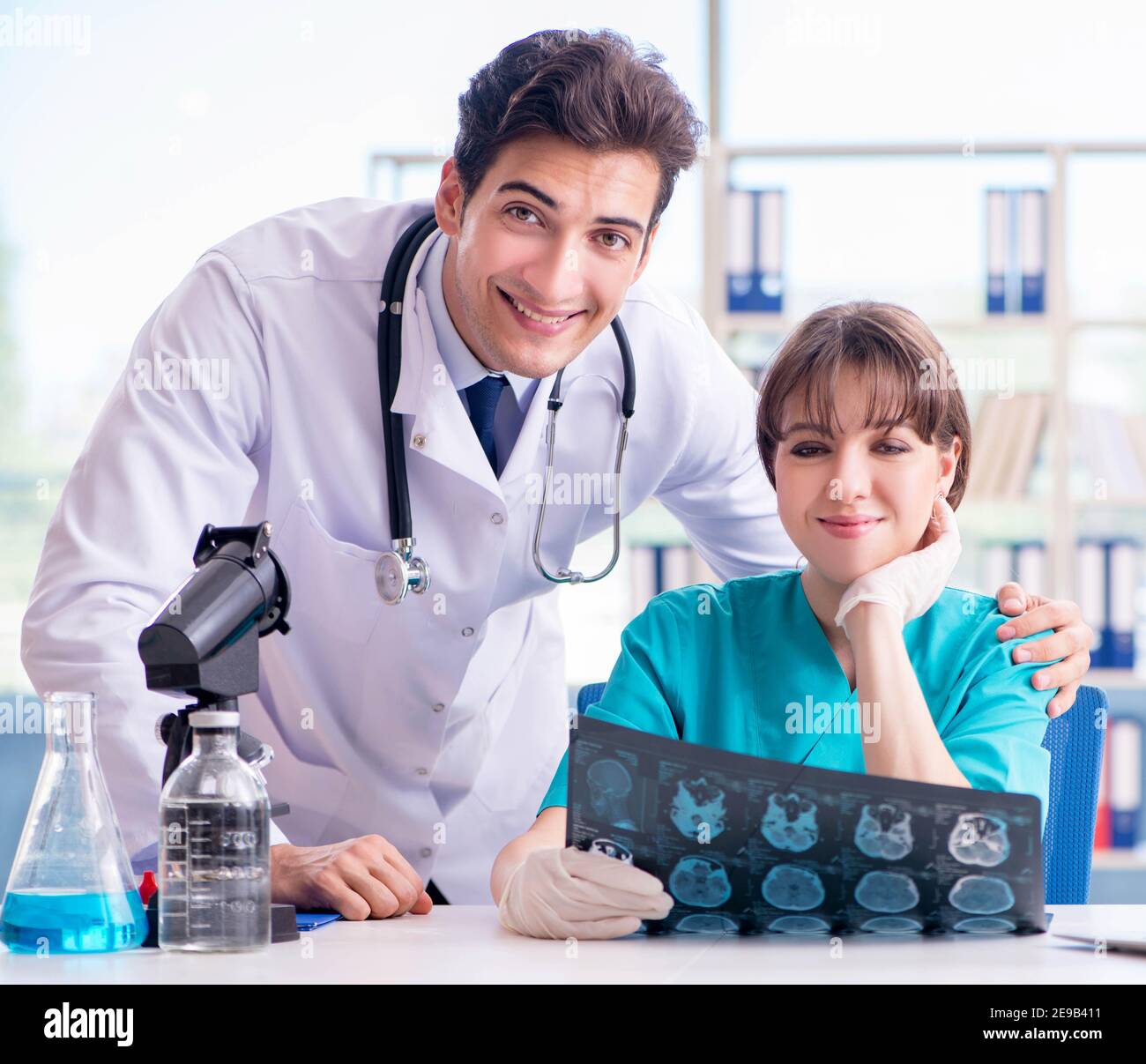 Two doctors discussing patient mri hi-res stock photography and images ...