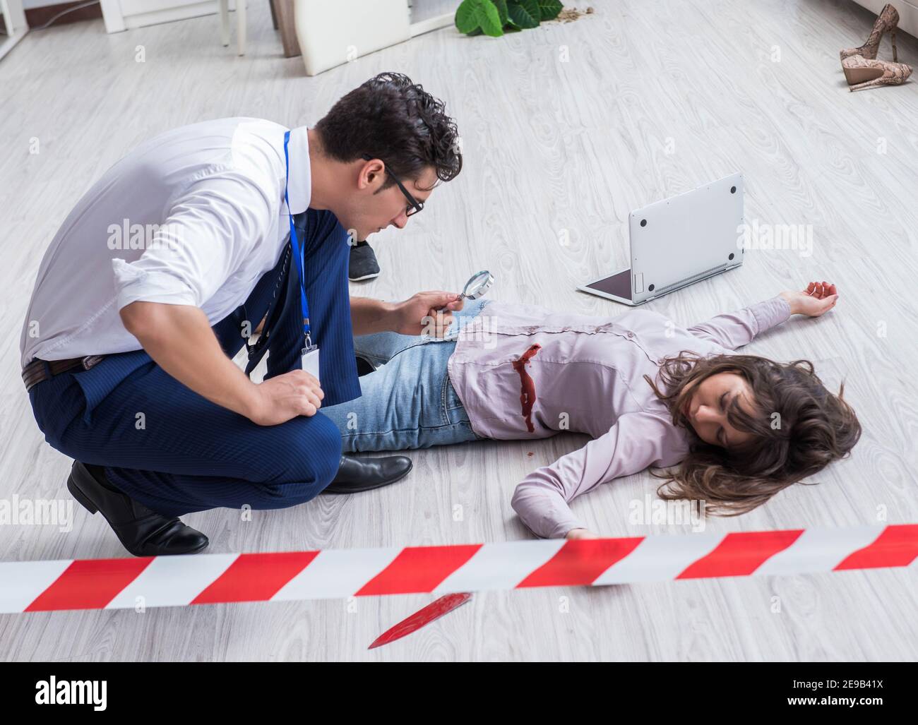 Forensic investigator at the crime scene investigating woman murder ...