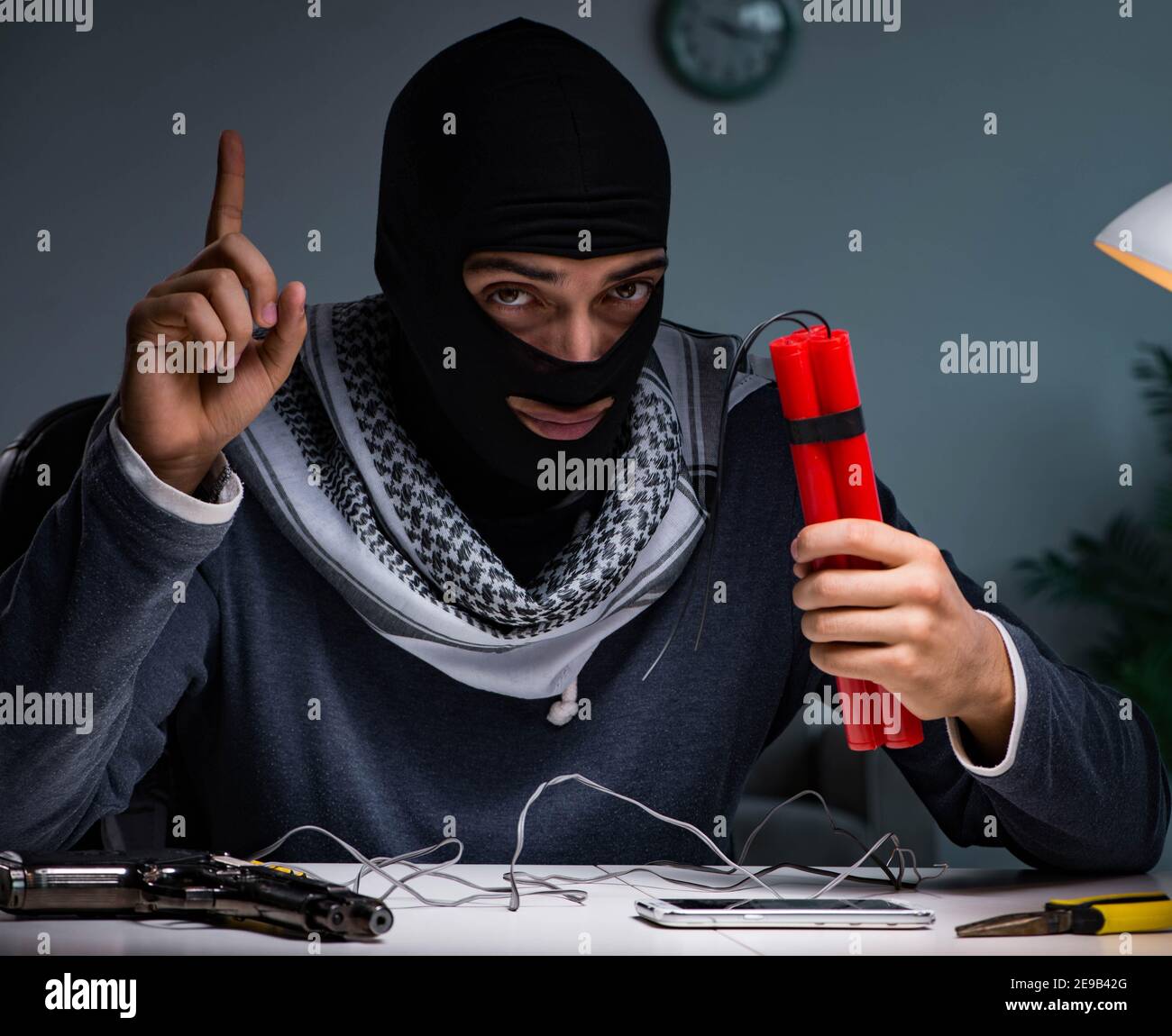 The terrorist bomber preparing dynamite bomb Stock Photo - Alamy