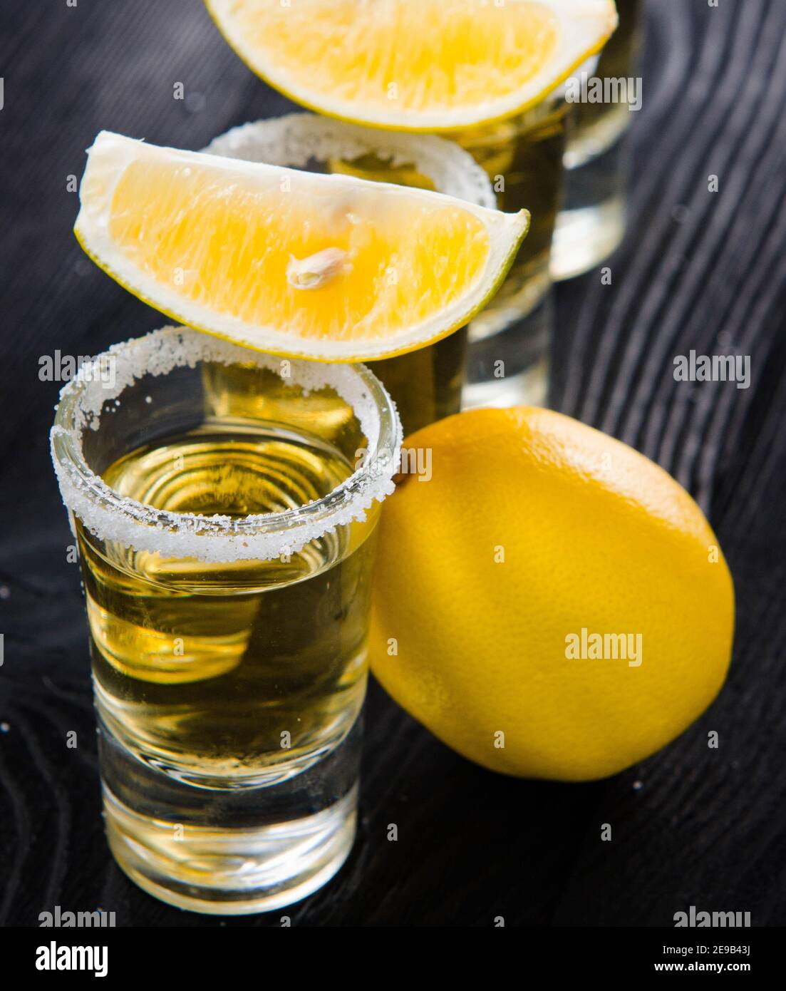 The tequila drink served in glasses with lime and salt Stock Photo - Alamy