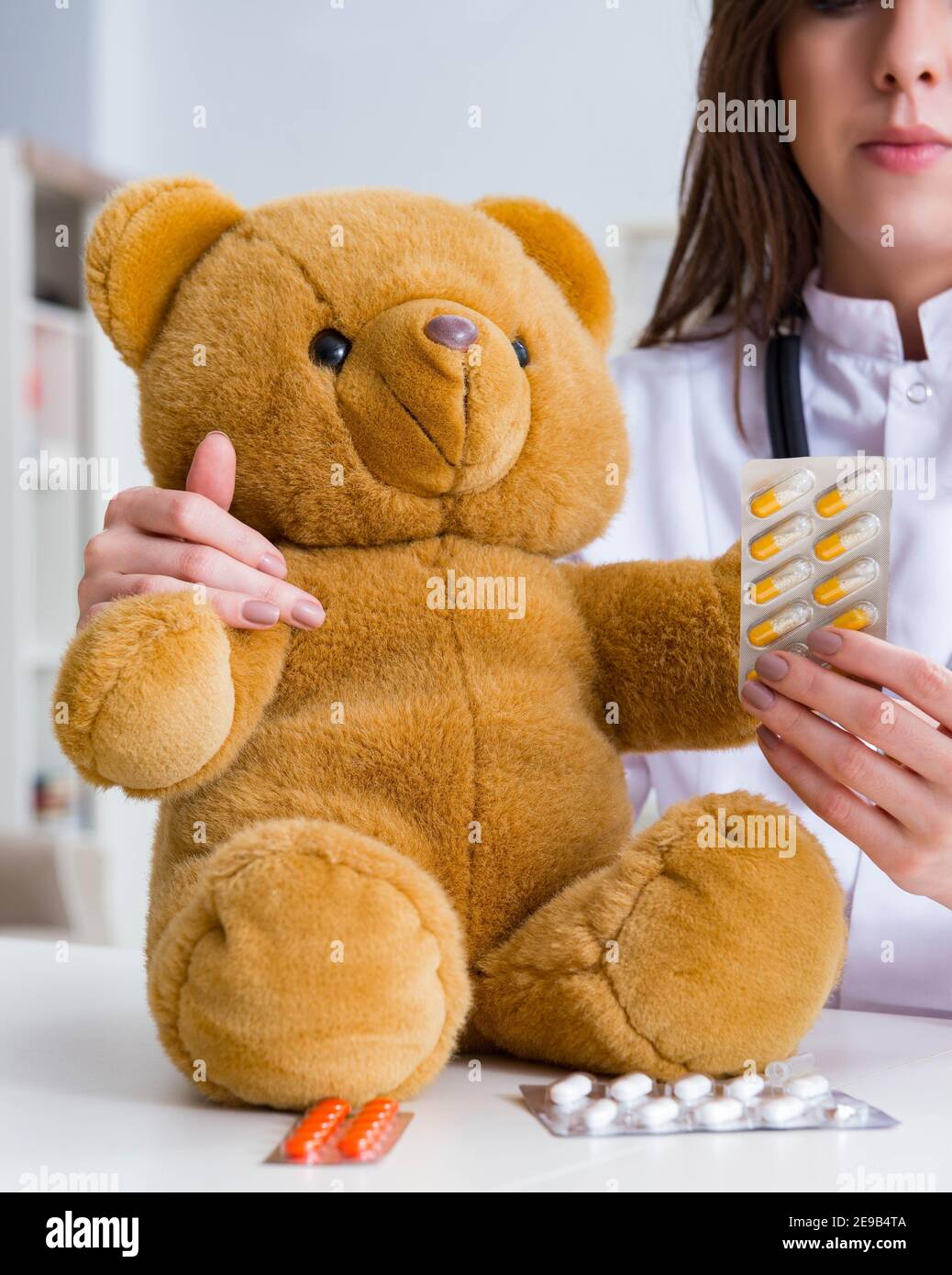 The child checking soft toy health Stock Photo - Alamy