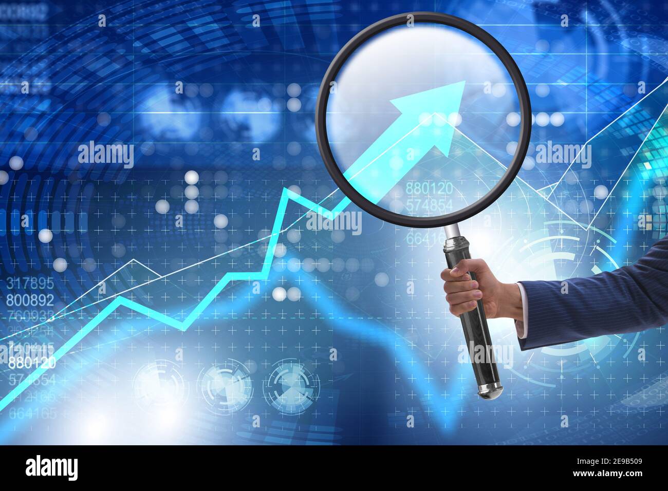 Concept of the economic growth with chart and magnifying glass Stock ...