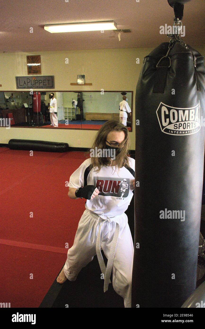 This action photo is of my son in his Karate class. Karate is a martial ...