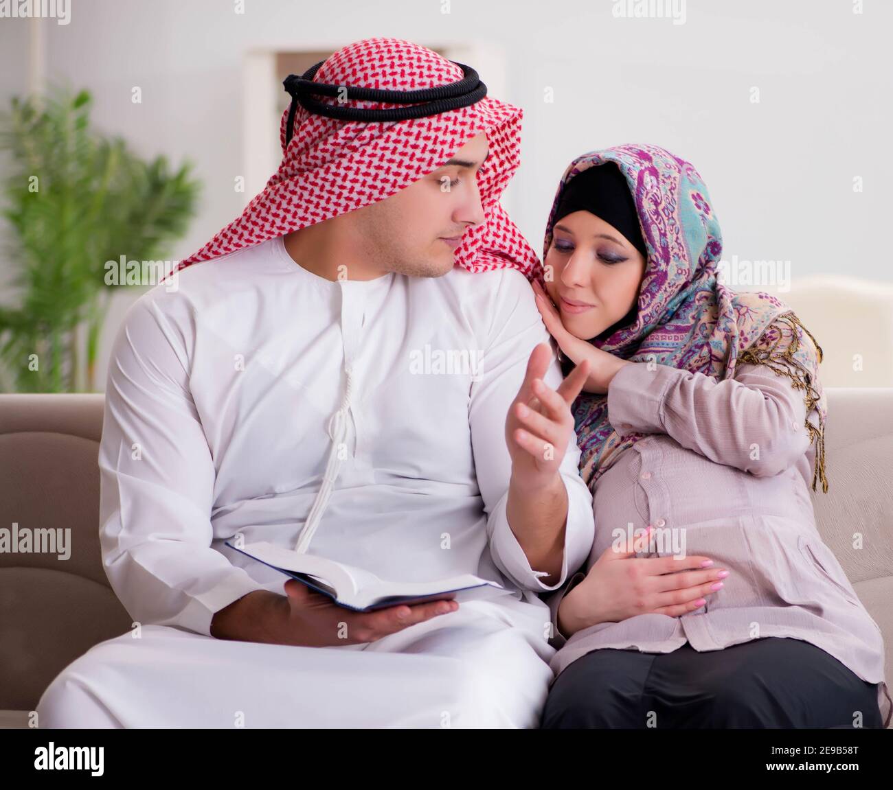 The young arab muslim family with pregnant wife expecting baby Stock ...