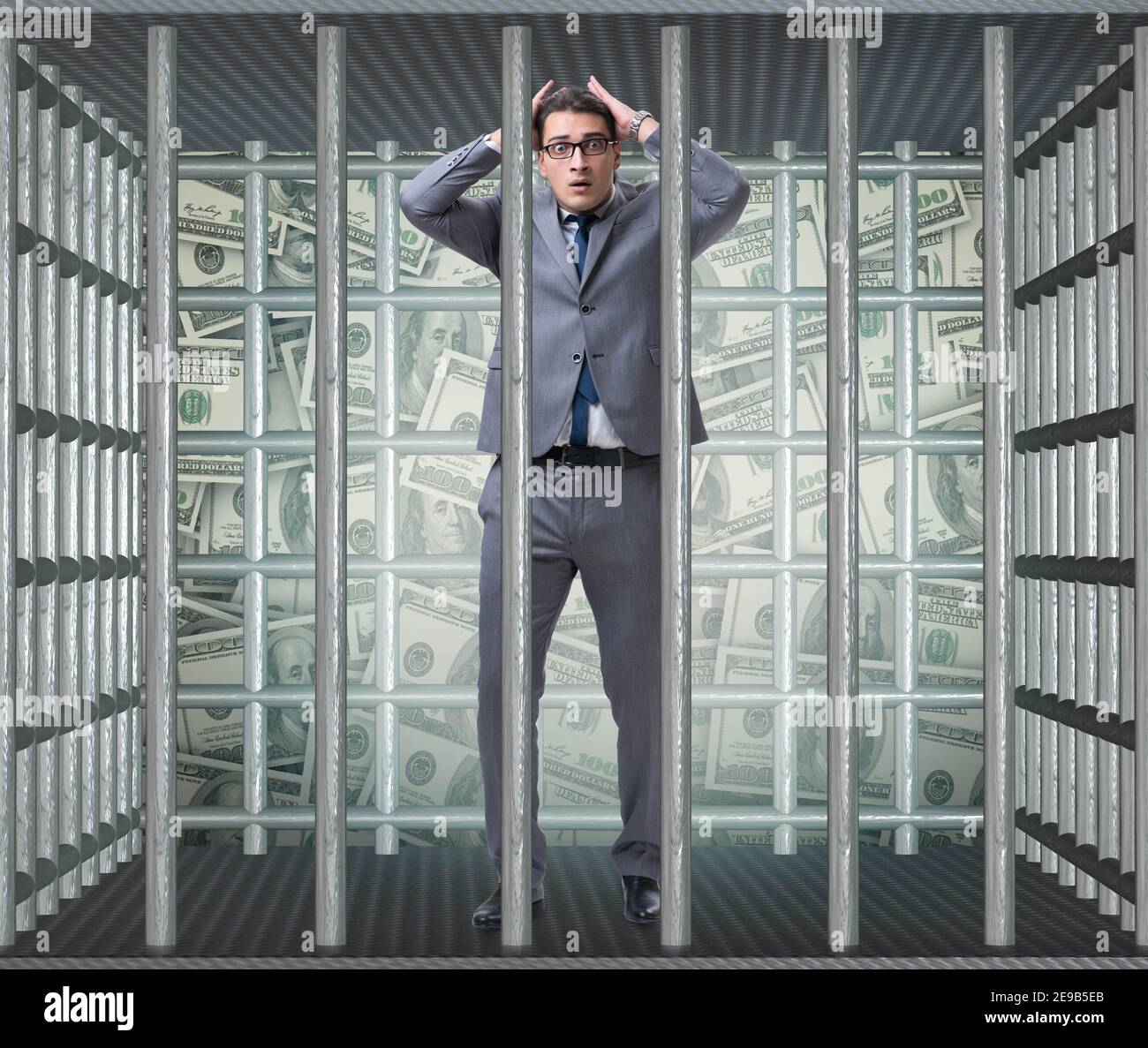 The man trapped in prison with dollars Stock Photo - Alamy