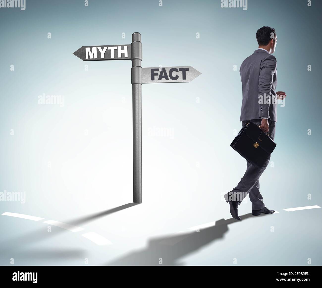 The businessman in difficult choice concept Stock Photo - Alamy