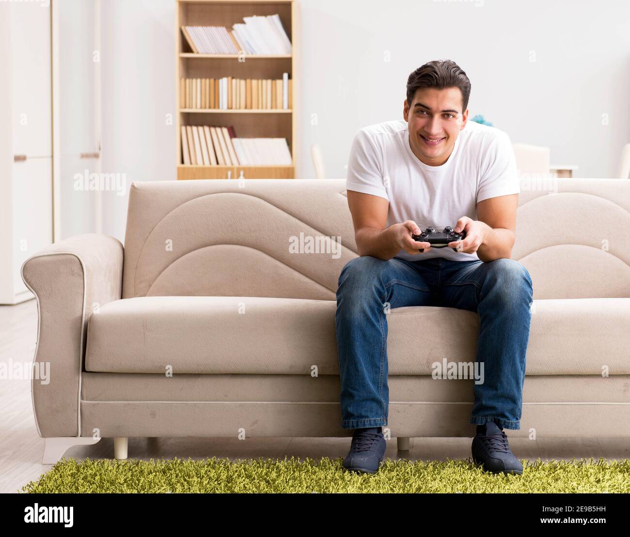 The man addicted to computer games Stock Photo - Alamy