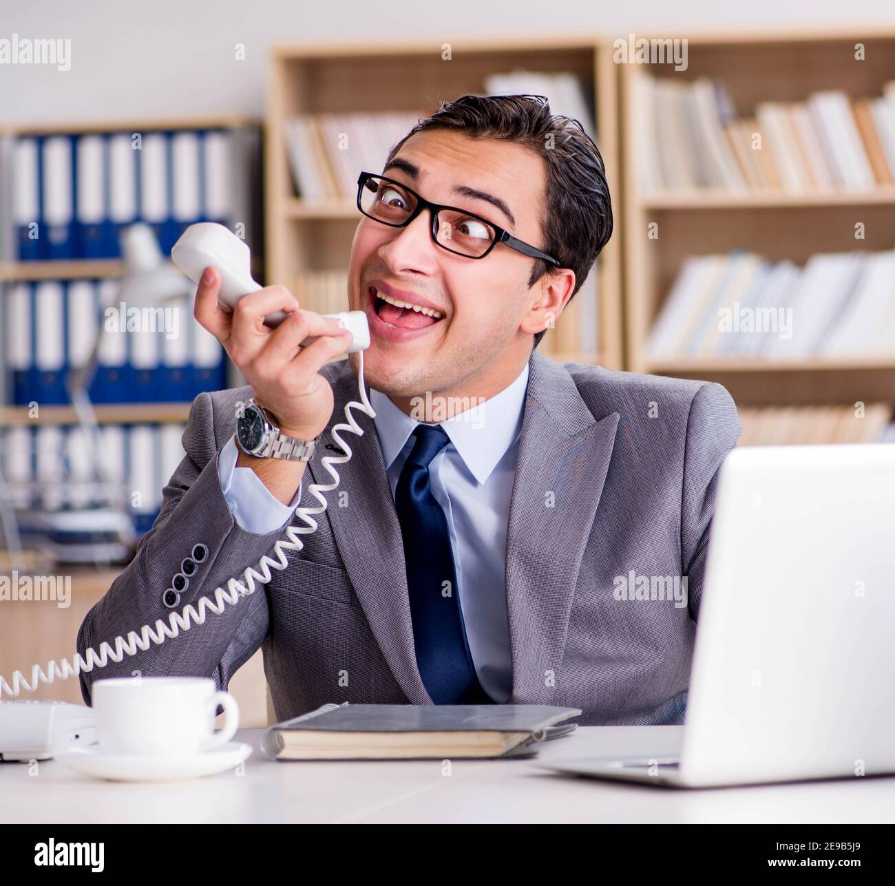 The funny businessman in the office Stock Photo - Alamy