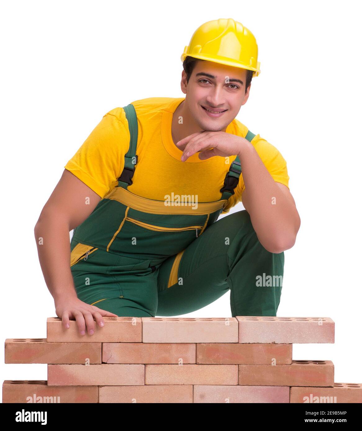 The the handsome construction worker building brick wall Stock Photo ...