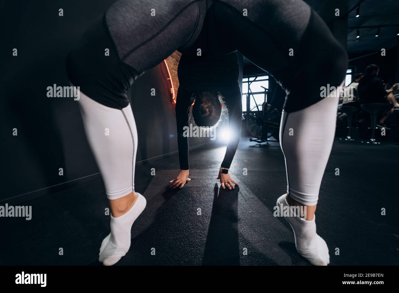 Slim athletic woman doing exercise bridge at gym Stock Photo - Alamy