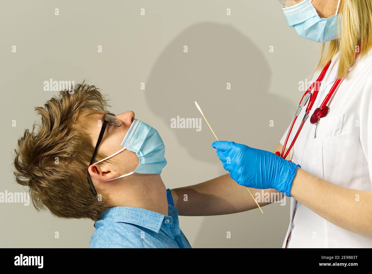 Pediatrician or doctor taking nasal mucus test, covid - 19 test . covid ...