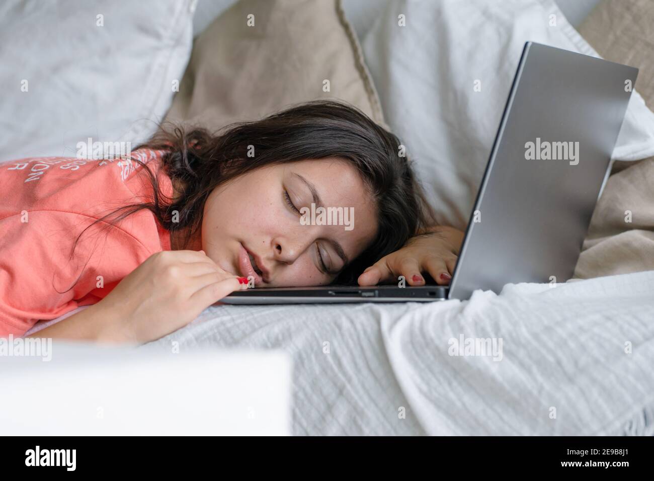 The girl fell asleep on a laptop while working. Sleep during working ...