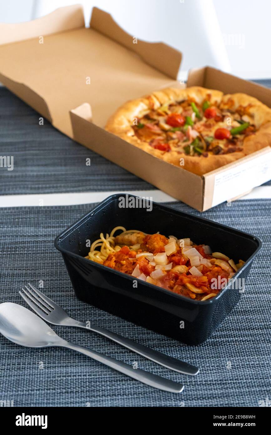 Set lunch, pizza with pasta. Food delivery Stock Photo - Alamy