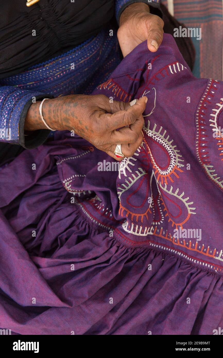 Hands of Embroidering Fabric Stock Photo - Alamy