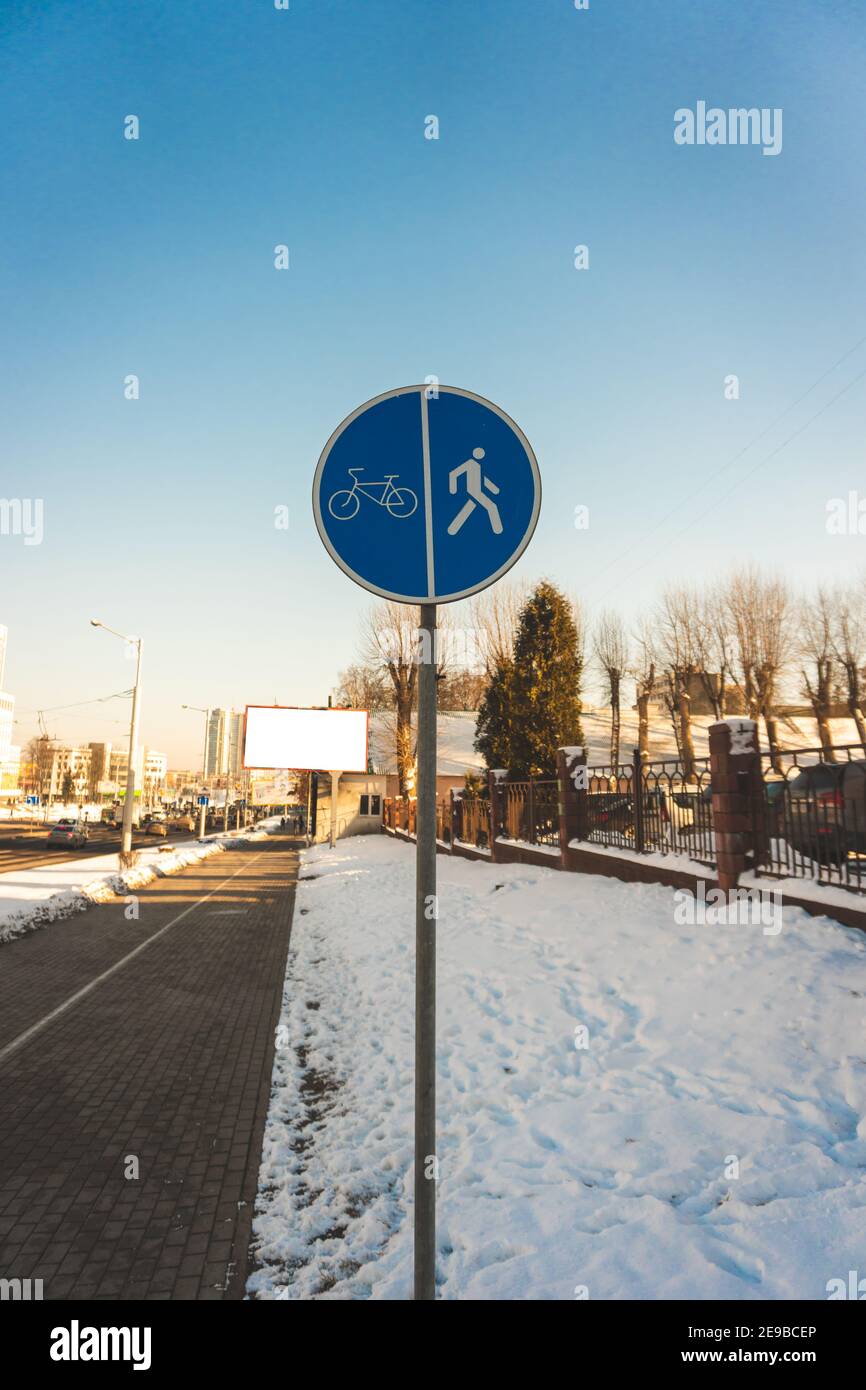 Round blue sign Pedestrian and Bicycle path close-up. A sign that ...