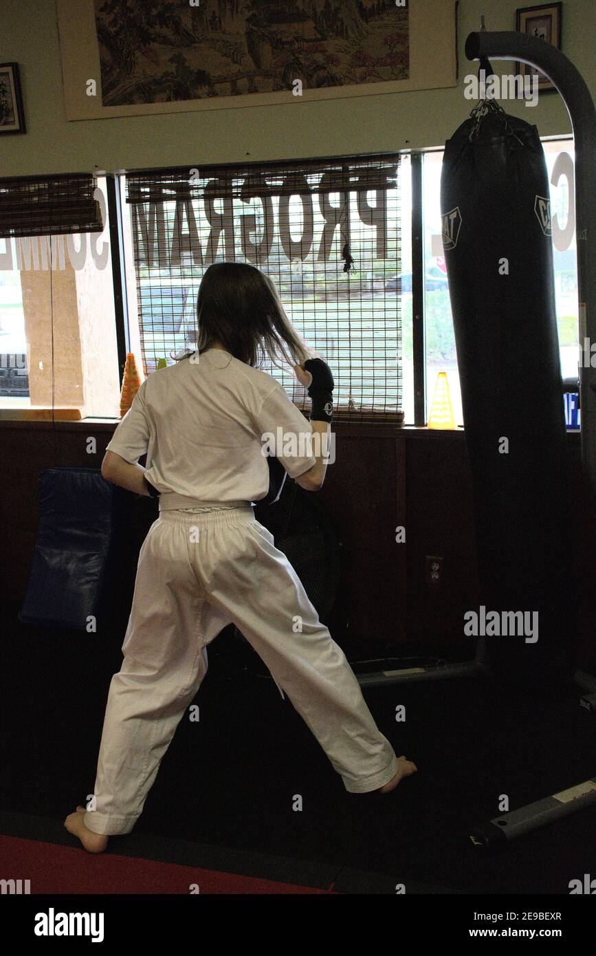 This action photo is of my son in his Karate class. Karate is a martial art that focuses on self ...