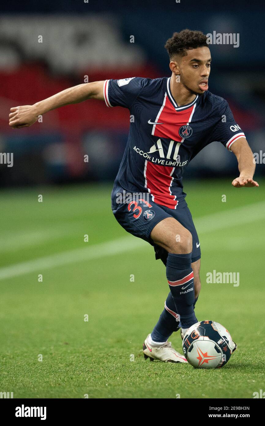 Colin Dagba of PSG in action during the Ligue 1 match between Paris ...