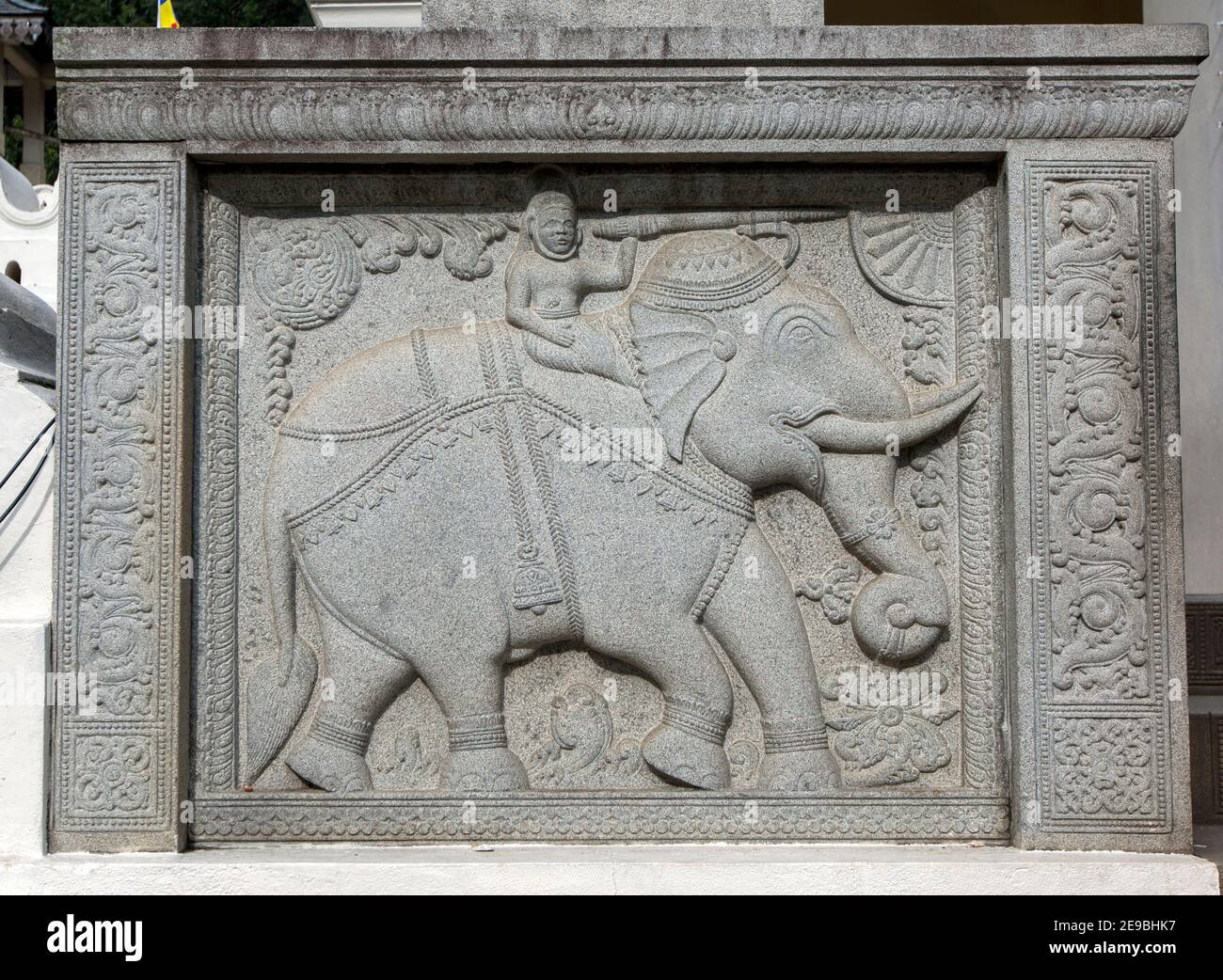 A stone carved elephant guardstone adjacent to the Maha Vahalkada or ...