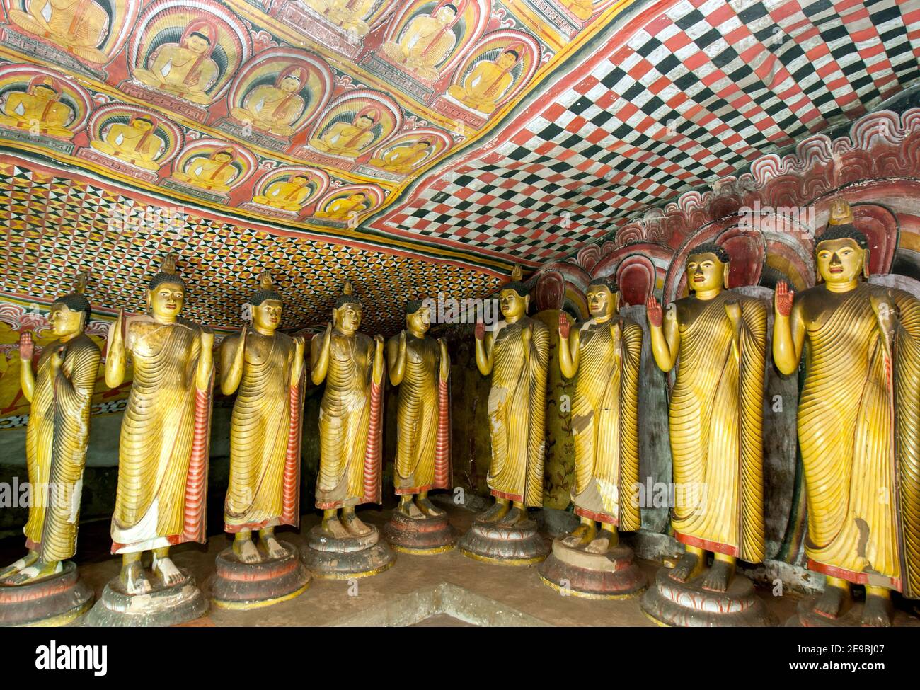 Standing Buddha statues inside Cave Three (Maha Alut Viharaya) at the ...
